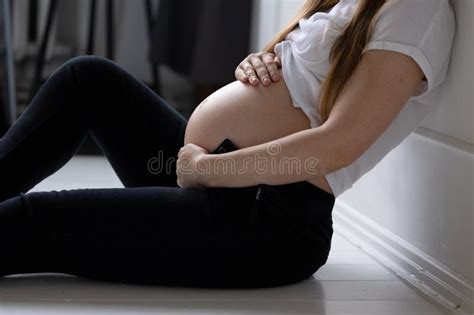 Close Up Belly Pregnant Girl White Top Fingers Hands Folded Heart