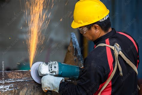 Industrial Worker Using Angel Grinder Cutting Metal Electric Grinder Cutting Metal Bright
