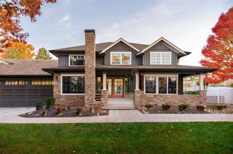 Modern Suburban Home Exterior With A Large Front Yard Bright And