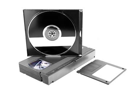 Premium Photo Vhs Video Cassette Floppy Disk And Cd Disk