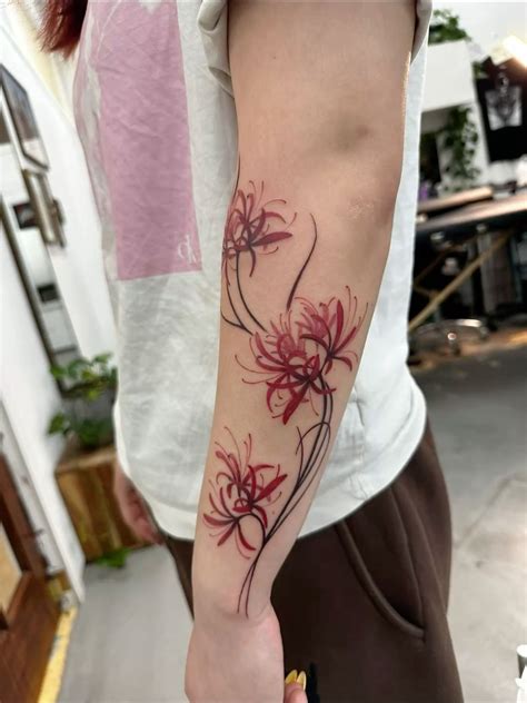 Forearm Spider Lily Tattoo Symbolism Design And Placement Tips