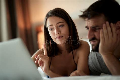 Couple In Bed Using Laptop Stock Image Image Of Browsing 134911619