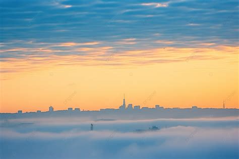 Sunrise Over A Fog Covered City Background Cloud Namsan Landmark Background Image And