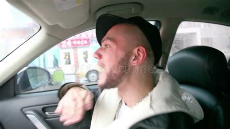 Adult Rapper In Cap Reads Rap When Sits In Car On Stock Footage Video Of Casual Motion 321522330