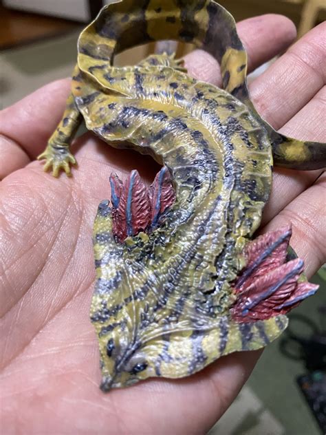 Toy Lizard On Hand