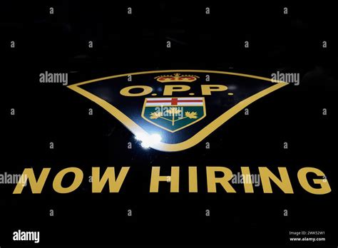 A Sign Of Ontario Provincial Police Or Opp In The Hood Of A Patrol Car