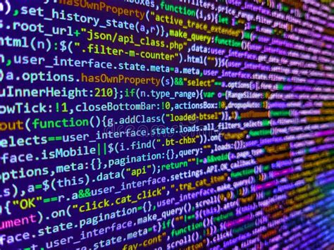Shallow Depth Of Field Effect Programmer Working In Computer Screen