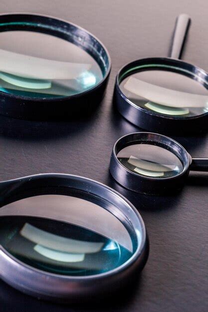 Premium Photo Closeup Of Magnifying Glass On Dark Surface