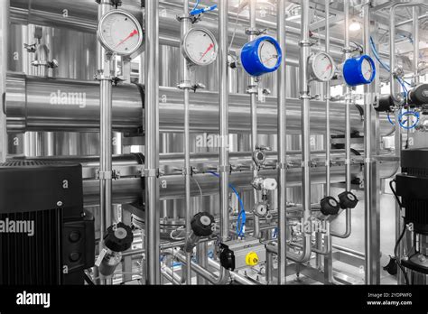 A Large Industrial Pipe System With Many Gauges And Valves The Gauges Are All Different Sizes