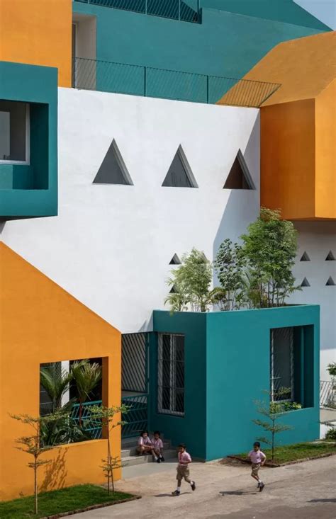 Vibrant School Facade Has A Certain Innocence In Its Rudimentary Shapes