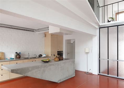 Assorted Windows And Diagonal Cladding Feature On Renovated Home