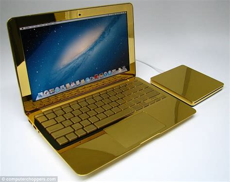 The Ultimate Midas Touch The Carat Gold MacBook Pros Complete With Diamond Apple Logos A