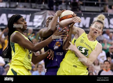 Phoenix Mercurys Sancho Lyttle Center Battles Seattle Storms Crystal Langhorne Left And