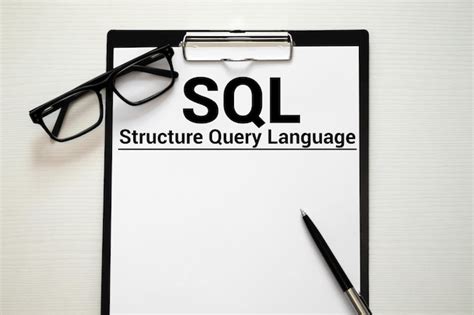 Premium Photo SQL Structured Query Language Written In Notebook On White Table