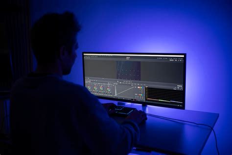 Premium Photo A Video Editor Focuses Intently On A Complex Editing