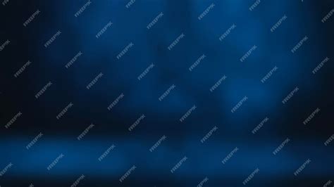 파란색 소프트 라이트 디스플레이가 있는 빈 어두운 콘크리트 벽 스튜디오 배경 및 바닥 원근 무료 사진