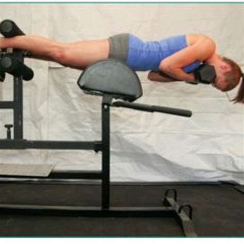 Dumbbell Back Extension Exercise How To Workout Trainer By Skimble