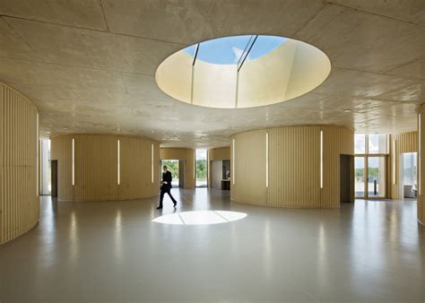 Plan 01s Crematorium Is Covered In Ribbed Concrete And Glass