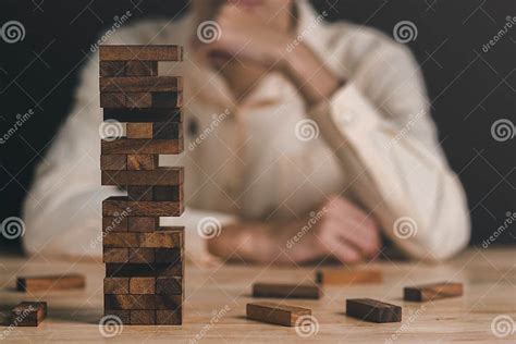 A Wooden Jenga Box Placed On The Tablefinancial Risk Management And