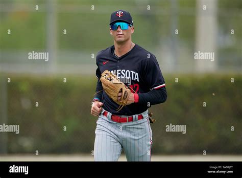 Minnesota Twins Outfielder Carson Mccusker 12 Jogs To The Dugout During An Milb Spring