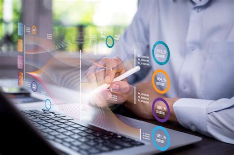 Premium Photo Businessman Using A Laptop With Analytics And Data Management Systems Analyst