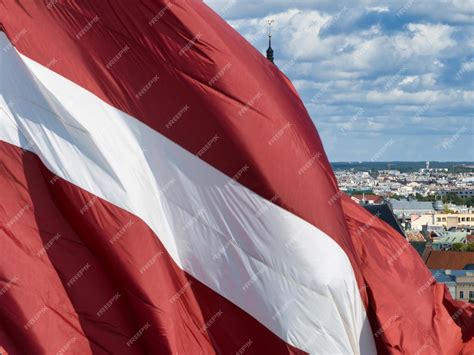 Premium Photo Panorama Of Riga City With A Big Latvian Flag In Foreground