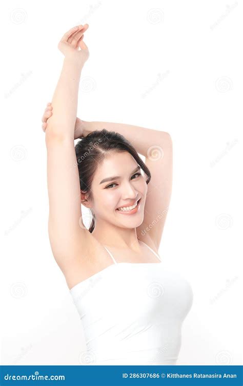 Beautiful Young Woman Lifting Hands Up To Show Off Clean and Hygienic Armpits or Underarms on ...