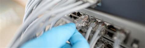 Hand Of It Engineer Technician With Lot Of Internet Network Cable In Wireless System Of Server