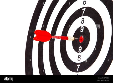 Red Plastic Arrow Hits Middle Of Dart Board Isolated On White Background Stock Photo Alamy
