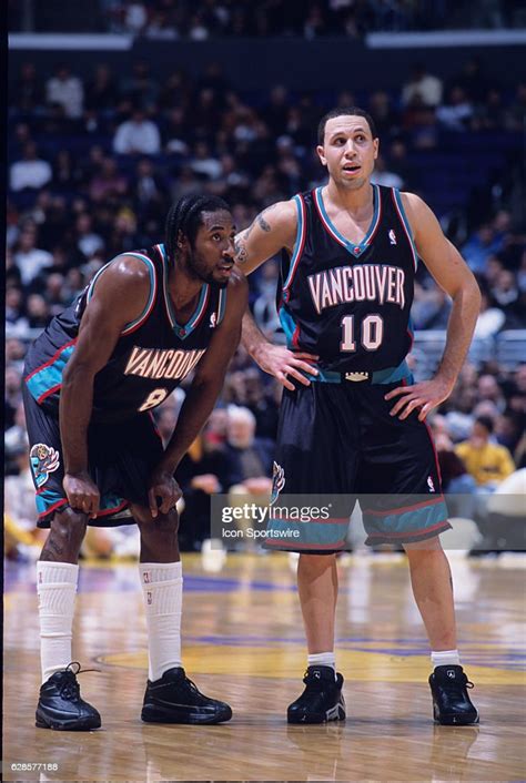 Michael Dickerson And Mike Bibby Of The Vancouver Grizzlies During A