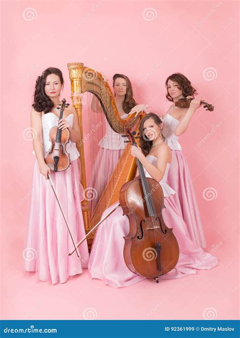 String Quartet On A Pink Background Stock Image Image Of Violinist