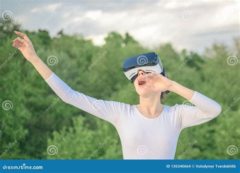 Enjoying New Technology Pretty Girl In Virtual Reality Headset Cute