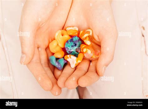 Different Types Of Ear Plugs In Female Hands Top View Personally Molded Earplugs For Noisy