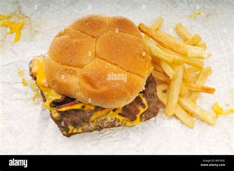 Wendy S Bacon Double Cheeseburger With French Fries On Wrapper Stock Photo Alamy