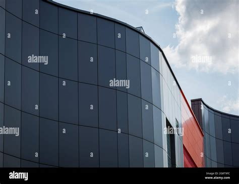 Curved Shape Of A Modern Building Metal Panels Of The Shopping Center
