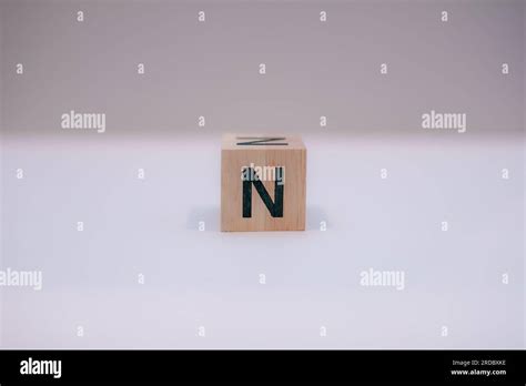 Wooden Block Written N With A White Background Stock Photo Alamy