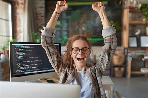 Photo Of Lovely Excited Glad Woman Software Developer Sitting Armchair