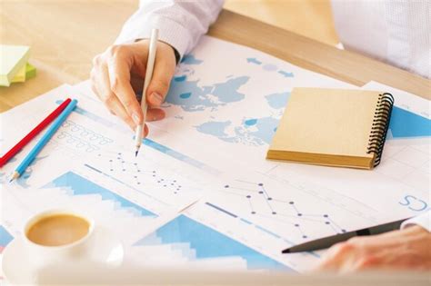 Premium Photo Man Analyzing Charts