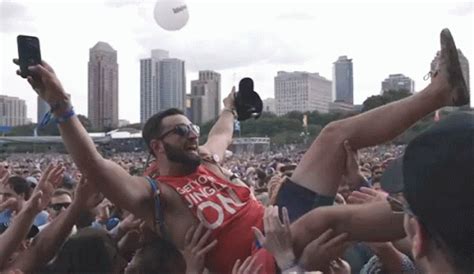 Crowd Surfing Passed On Overhead  Crowd Surfing Passed On Overhead