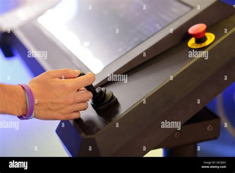 operator controls equipment with joystick control console with