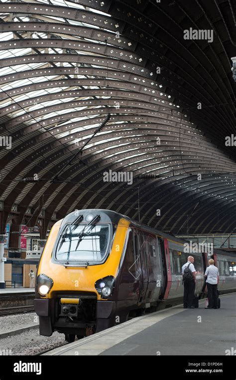 Class 220 Voyager Passenger Train In Crosscountry Livery Waiting At A
