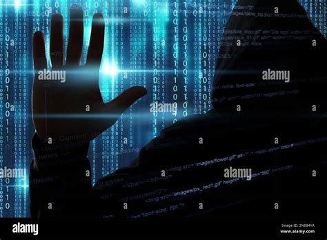 Man In Hood And Digital Binary Code On Dark Background Cyber Attack