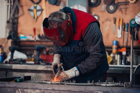 Welder Erecting Technical Steel Industrial Steel Welder In Factory Technical Stock Image