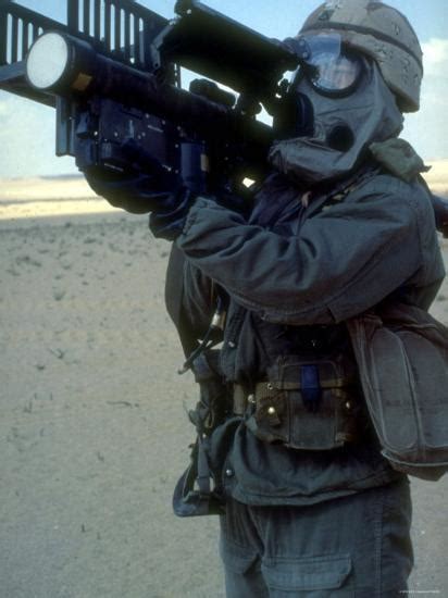 Us Soldier Wearing Mopp 4 Anti Chemical Suit And Aiming Stinger Missile Perched On Shoulder