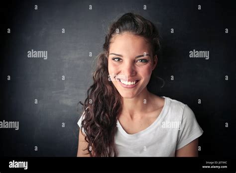 Brunette Woman Smiling Inside Stock Photo Alamy