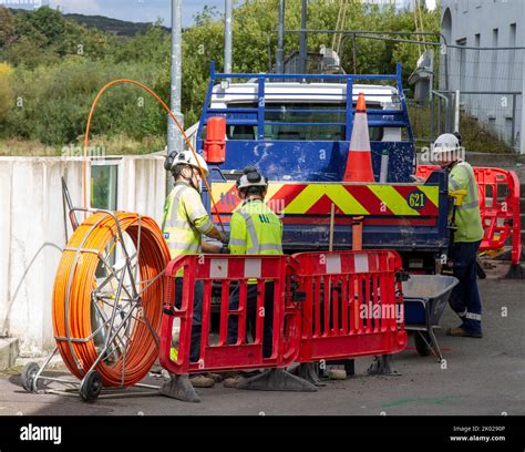 Engineers Installing Fibre Optic Cable Underground Stock Photo Alamy