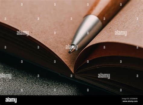 Opened Notepad With Automatic Plastic Ballpoint Pen Close Up Stock