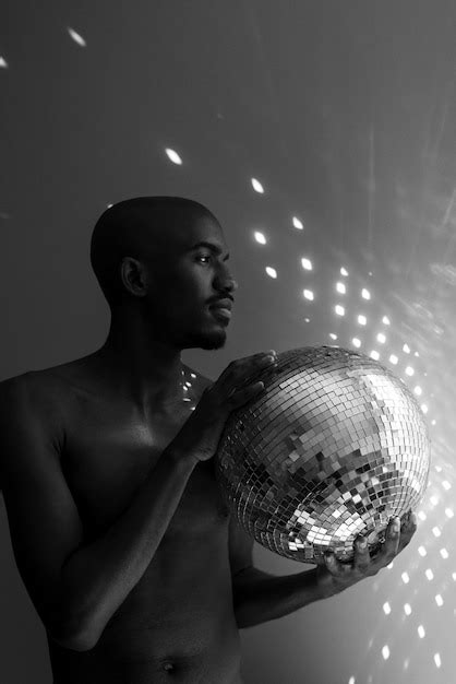 Free Photo Medium Shot Naked Man Holding Disco Ball