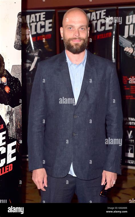 Martin Christopher Bode Attends The Ultimate Justice Premiere At Amc