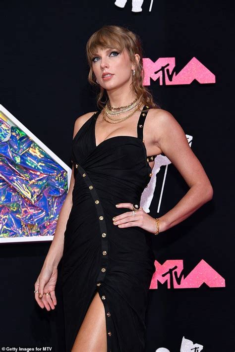 Taylor Swift Puts On A Leggy Display In An Asymmetric Black Gown